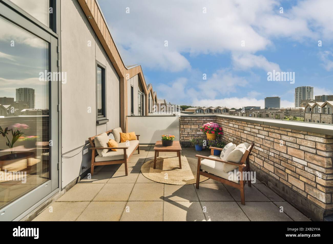 This inviting terrace features comfortable seating arrangements against ...