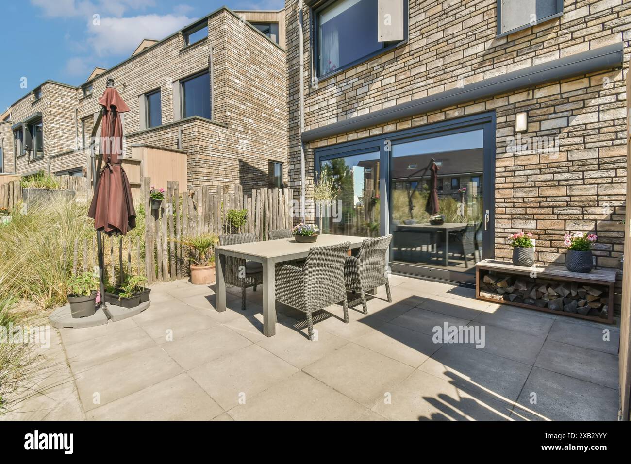 Elegant outdoor terrace featuring modern furniture and design accents ...