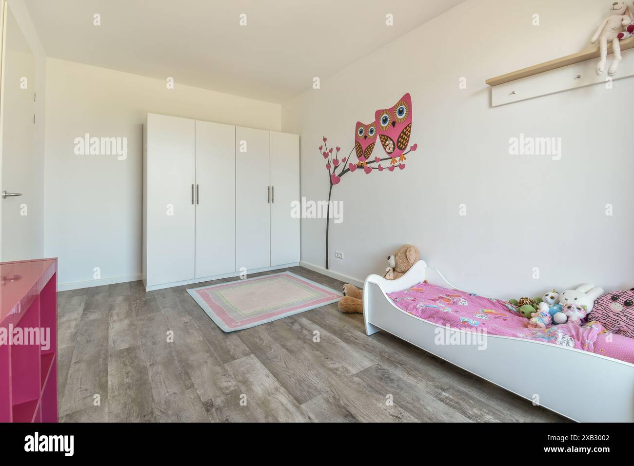 A well-lit child bedroom in Duintopstraat featuring a white bed with ...
