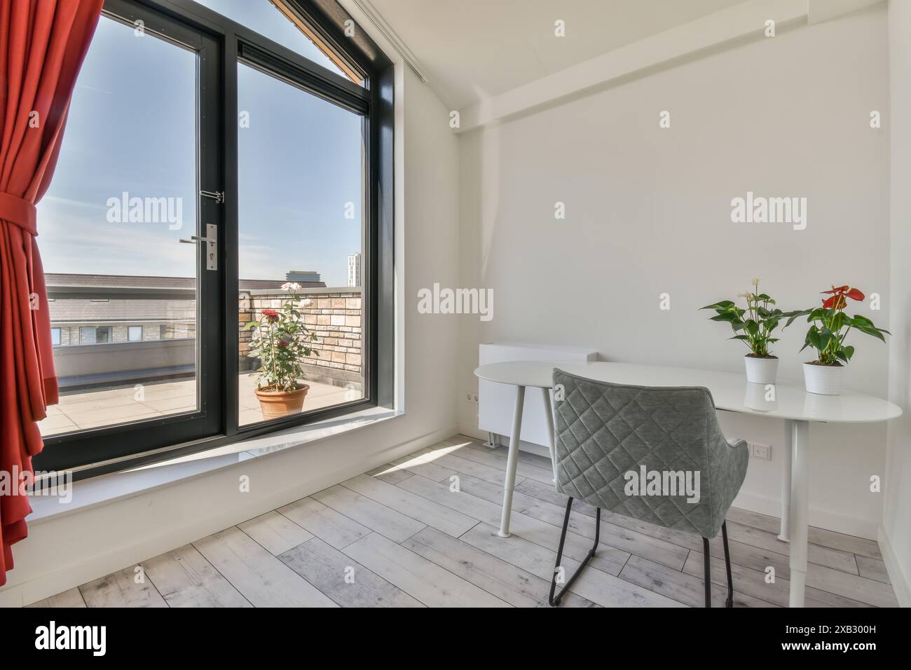 Modern corner room with an open view of the urban skyline, featuring ...