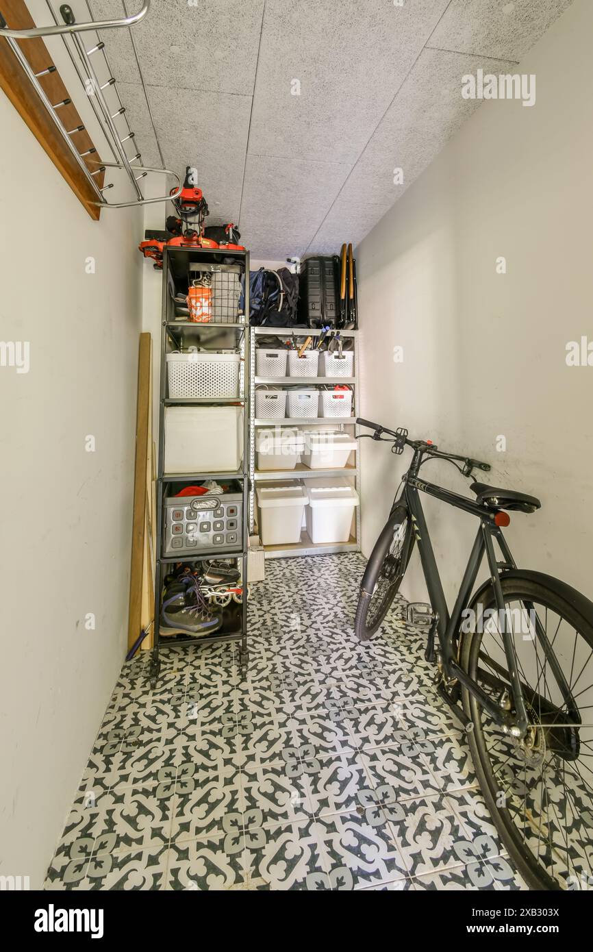 A neatly organized home storage room featuring black and white ...