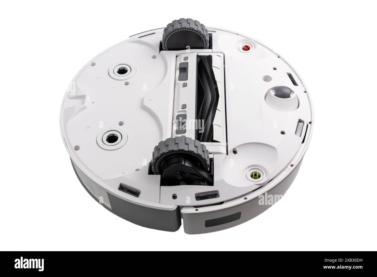 A white robot with black wheels is shown in an open case. Robot vacuum ...