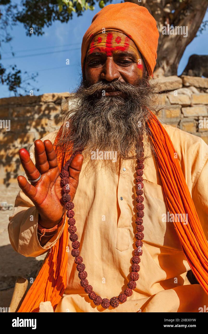 Indian sadhu holy man blessing Stock Photo - Alamy