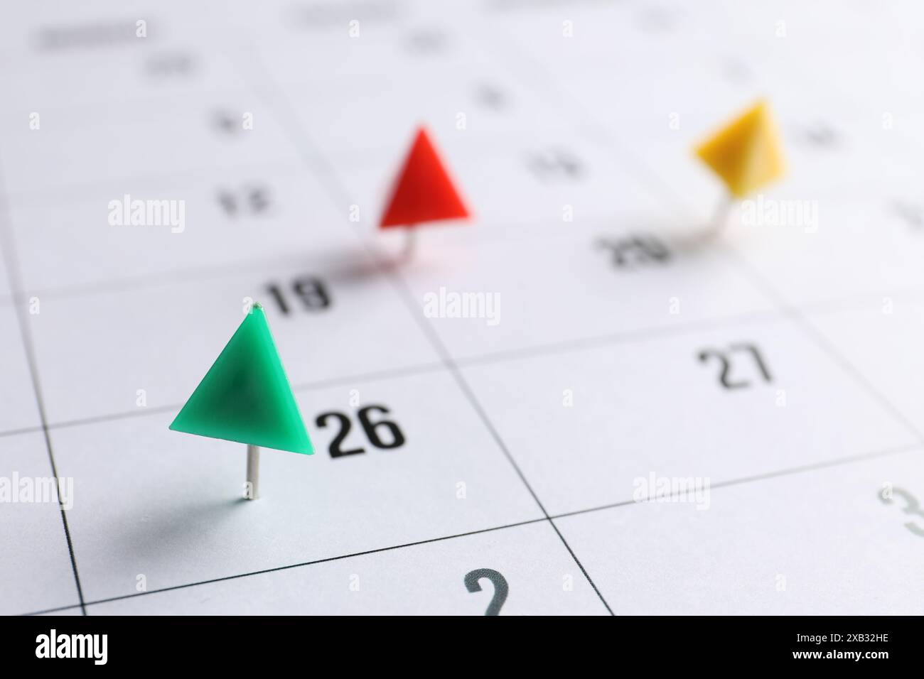 Timetable. Calendar page with drawing pins, closeup Stock Photo - Alamy