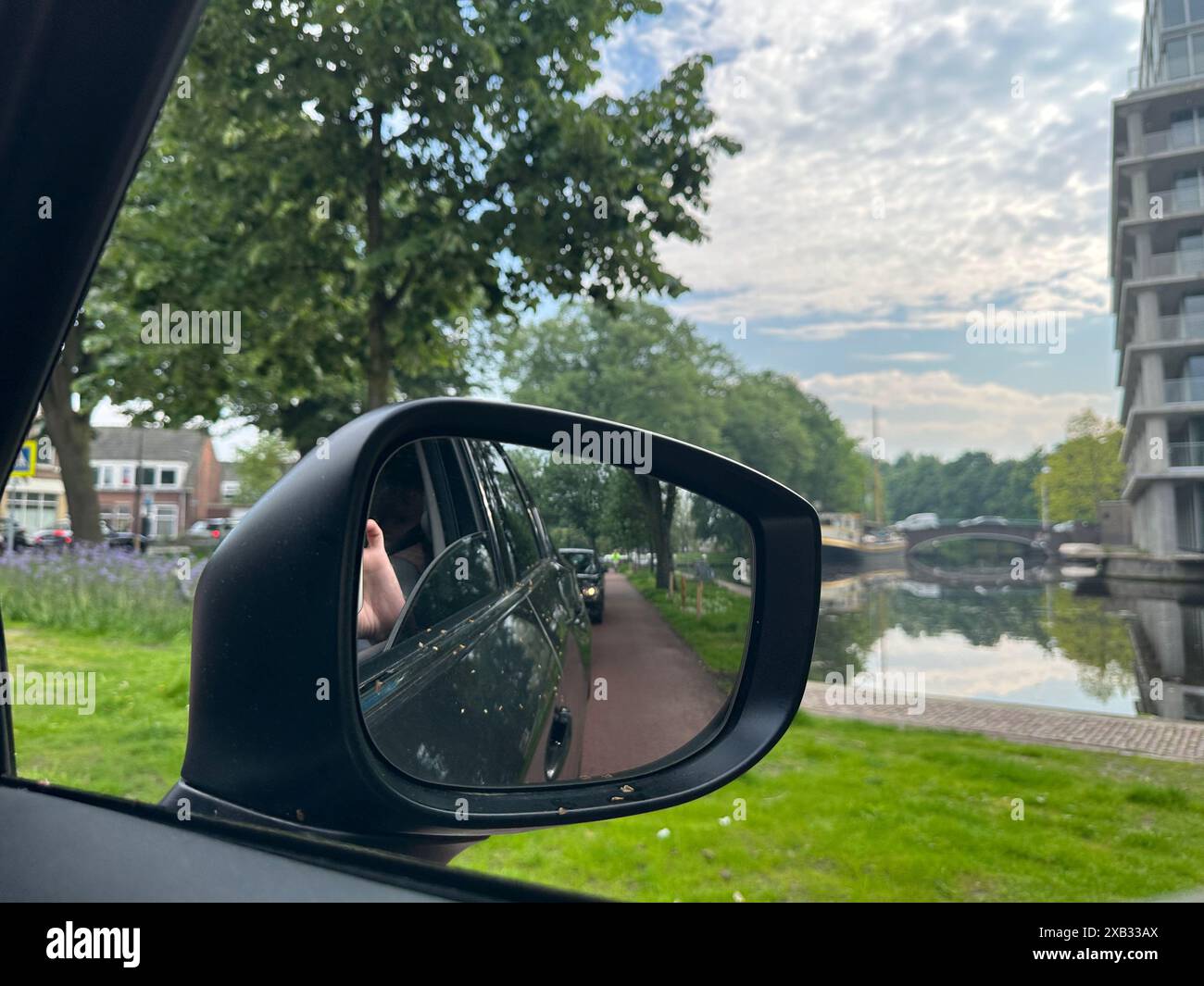 Side view mirror of modern car, closeup Stock Photo - Alamy