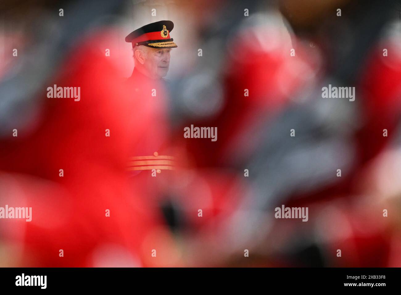 King Charles III, Colonel-in-Chief of the Household Division, presents ...