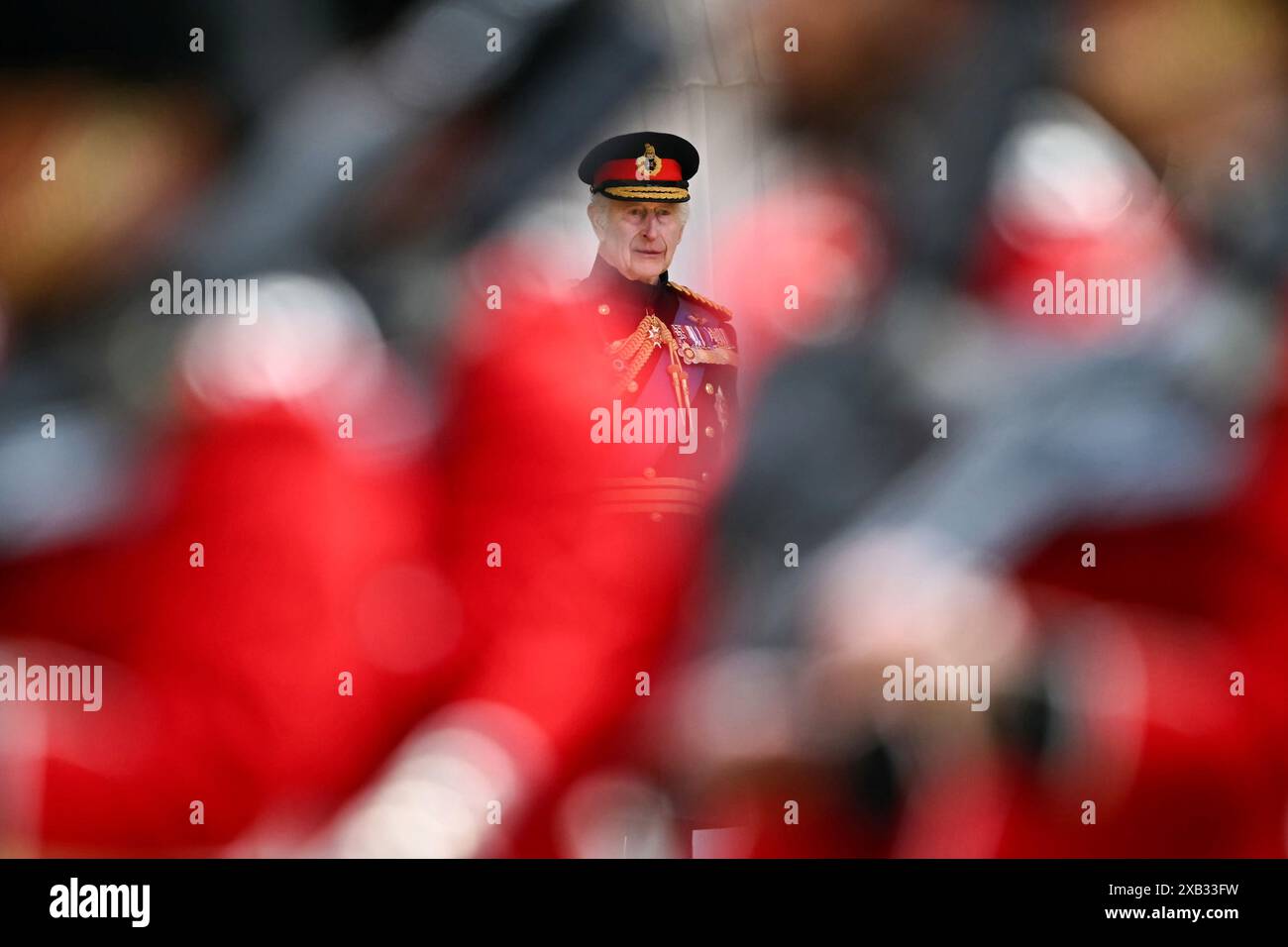 King Charles III, Colonel-in-Chief of the Household Division, presents ...