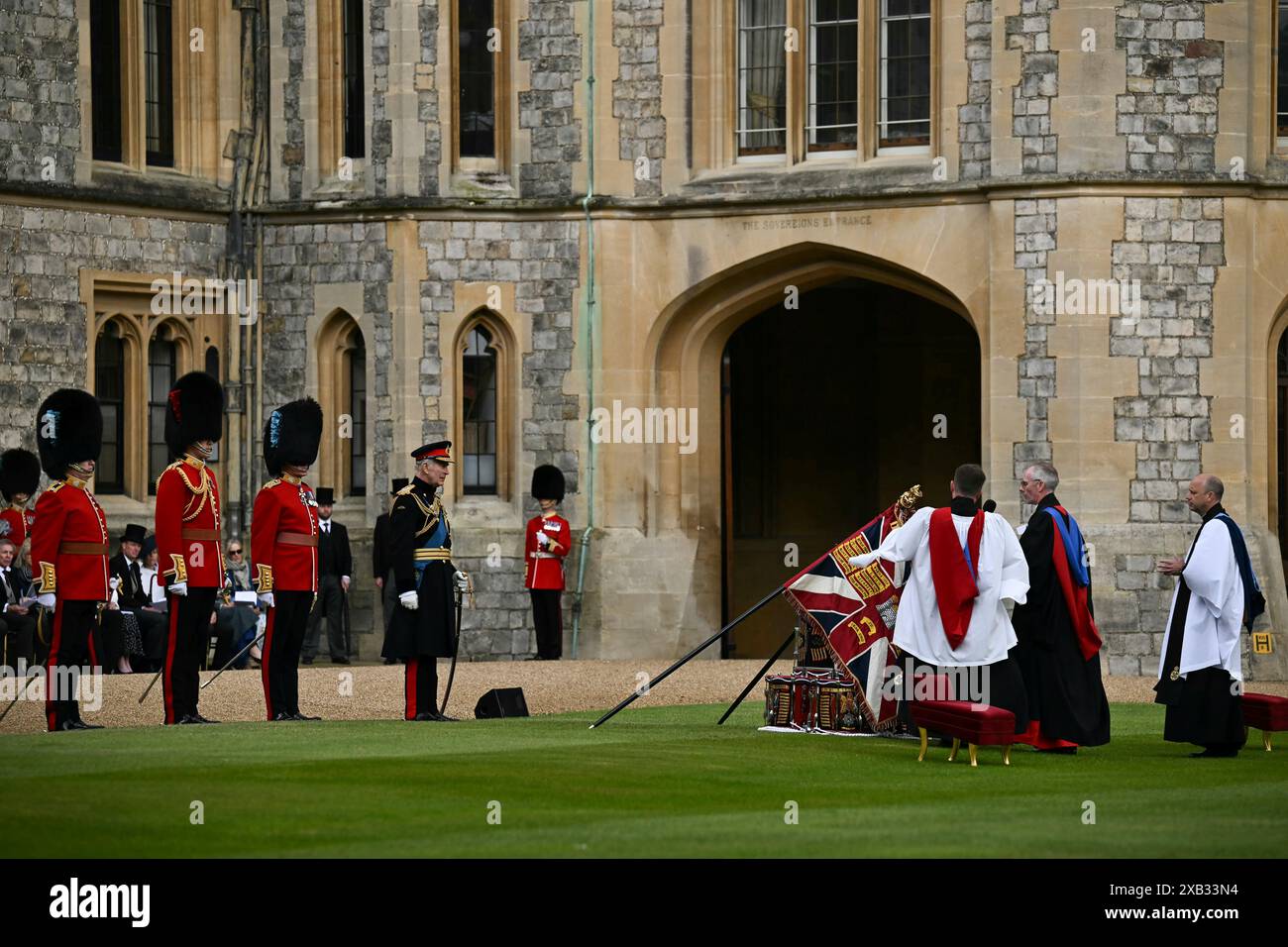 King Charles III, Colonel-in-Chief of the Household Division, presents ...
