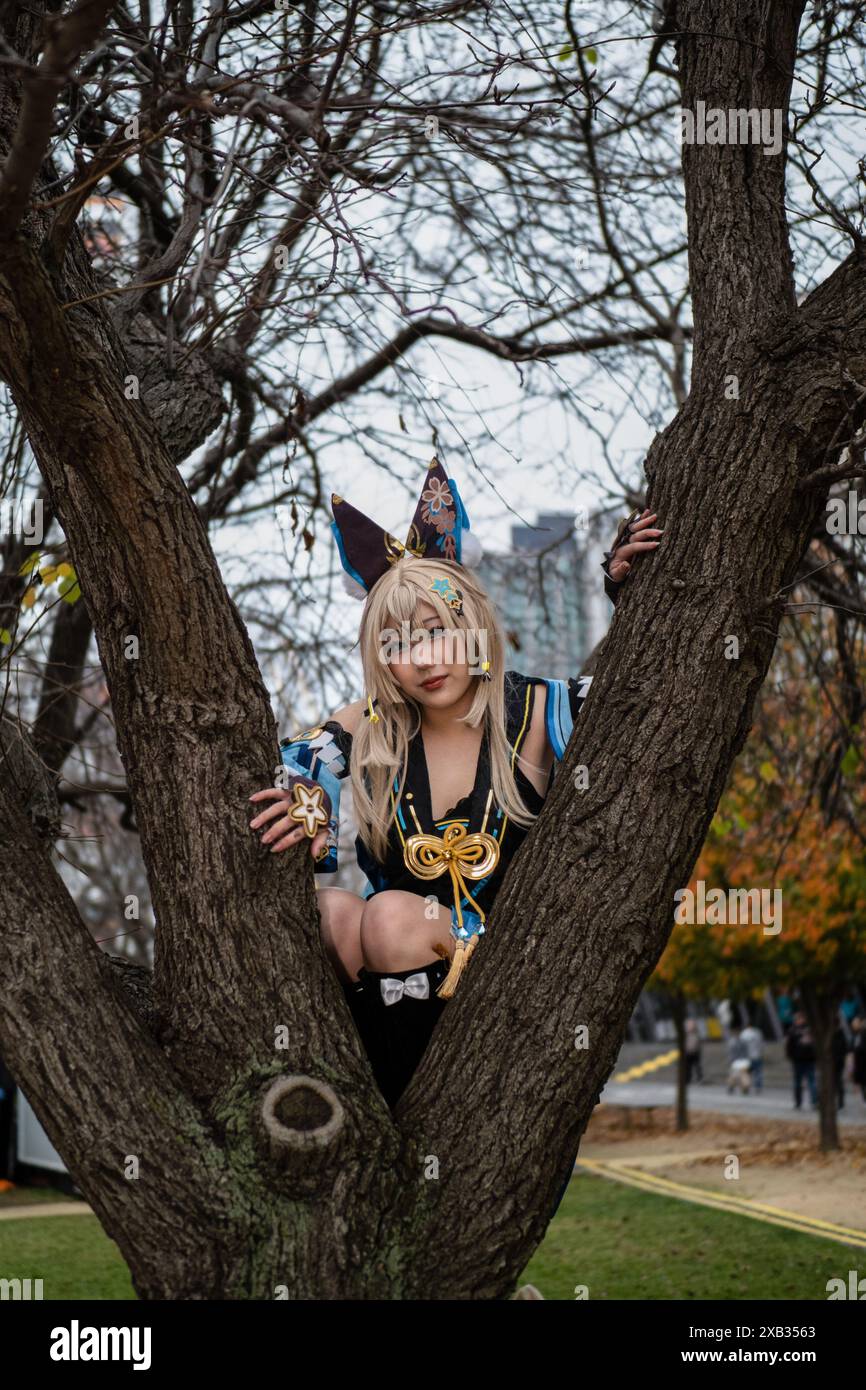 An attendee seen in a fancy costume during an event. An estimated ...