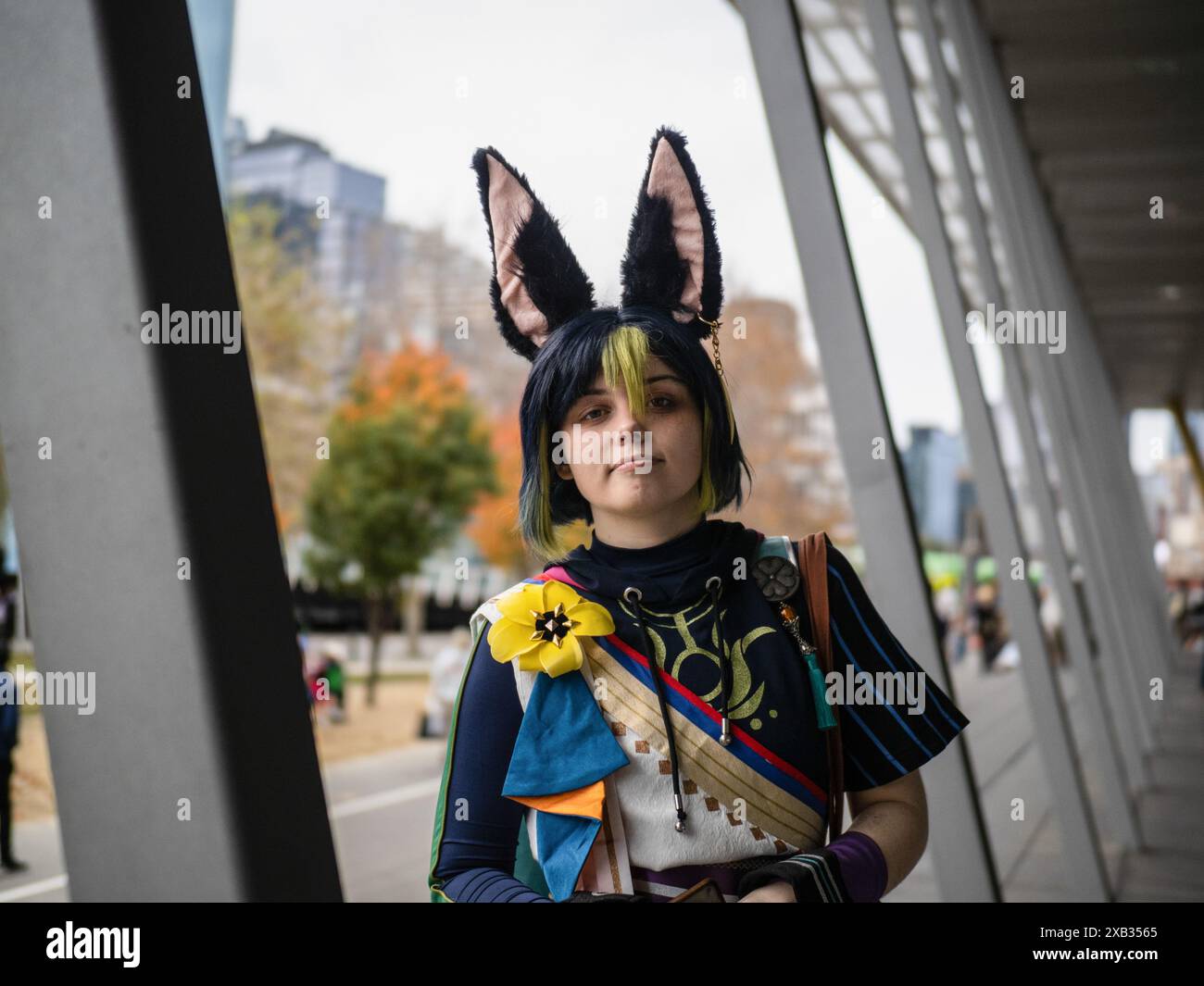 An attendee seen in a fancy costume during an event. An estimated ...