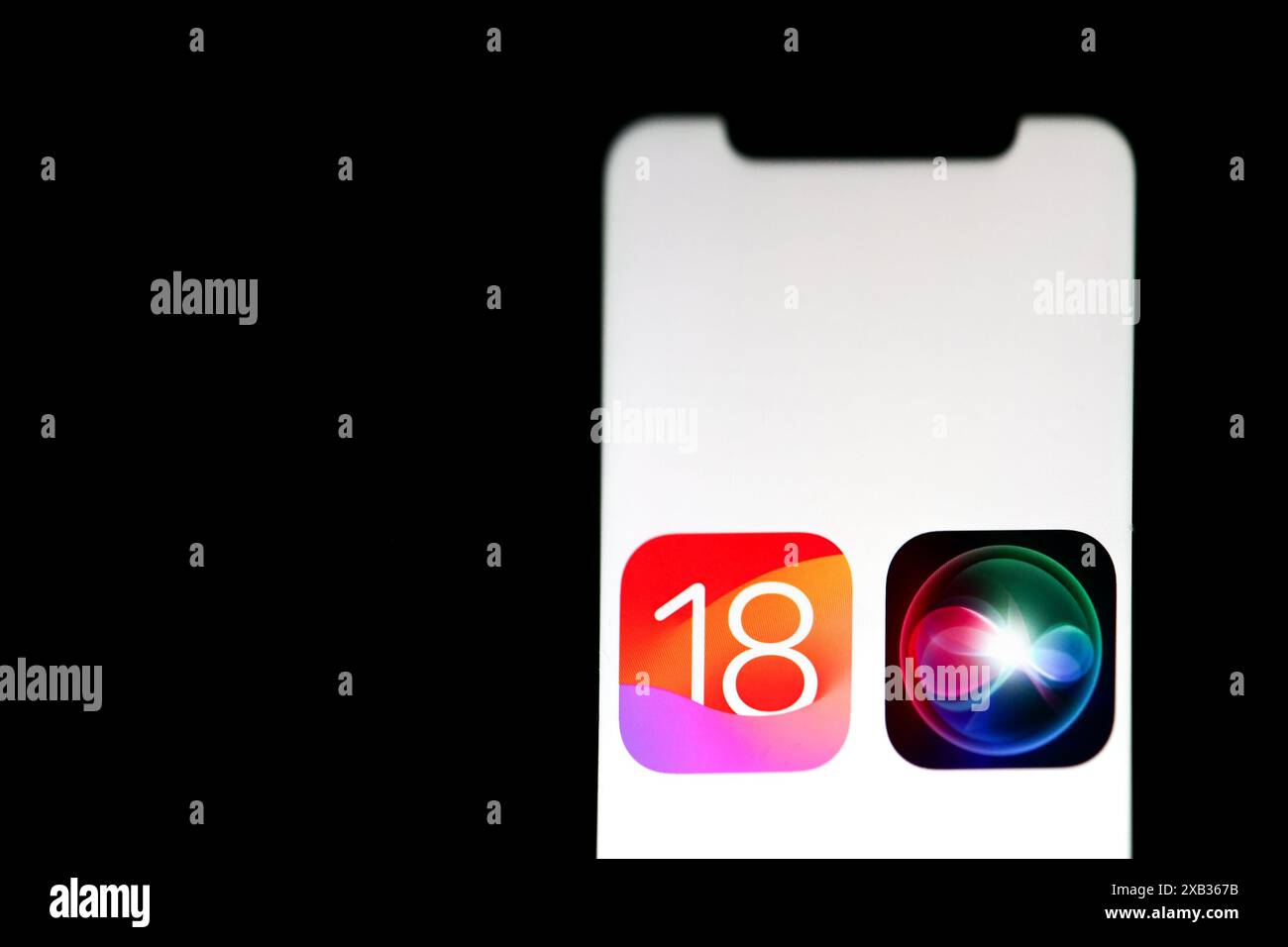 In this photo illustration a Apple iOS 18 and Siri AI assistant logo ...