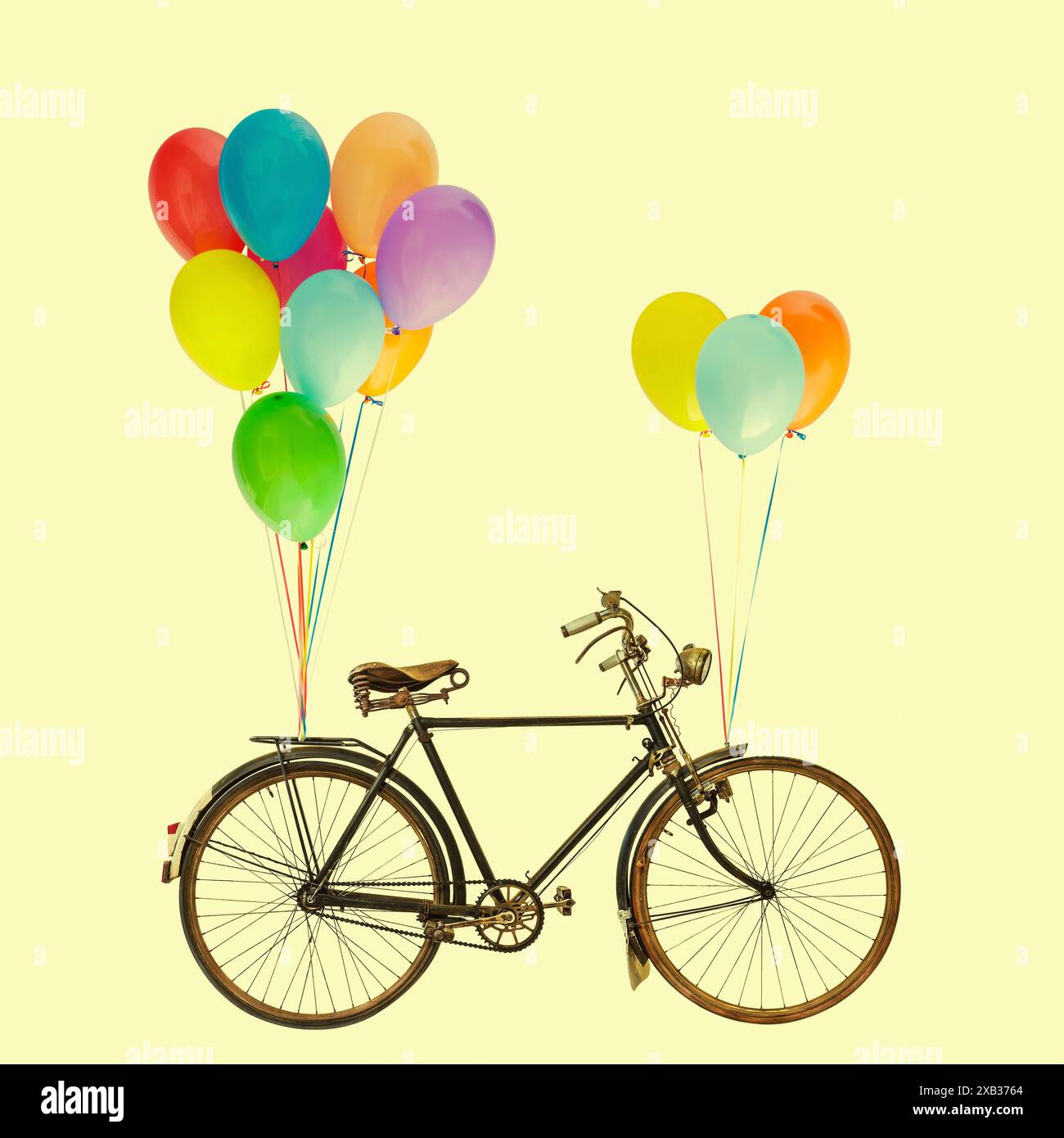 Vintage bicycle with two sets of colorful hanging balloons Stock Photo - Alamy