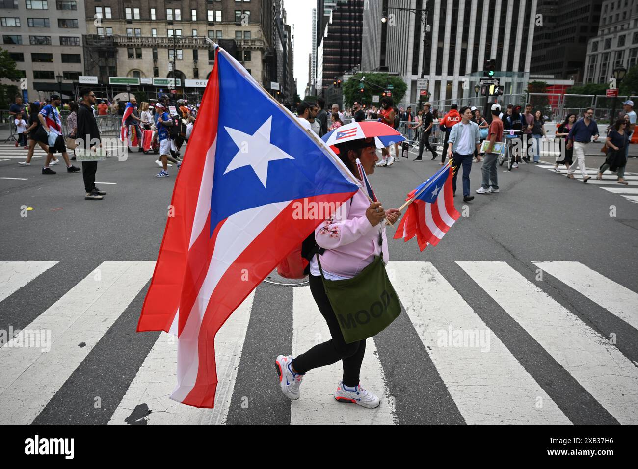 People march in the National Puerto Rican Day Parade on June 09, 2024 in New York City Stock ...