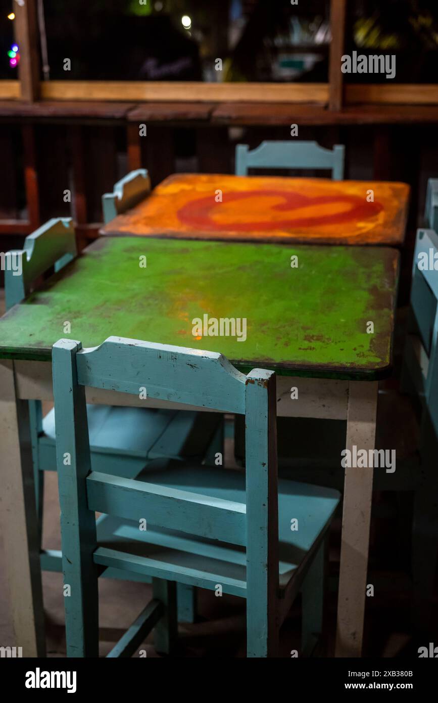 Quaint restaurant with rustic tables and chairs, El Tunco, surf town in ...