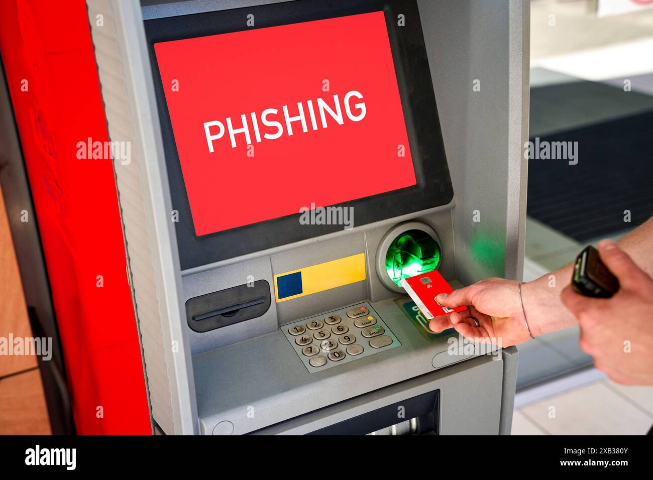10 June 2024: Man inserts a debit card into an ATM with the inscription ...