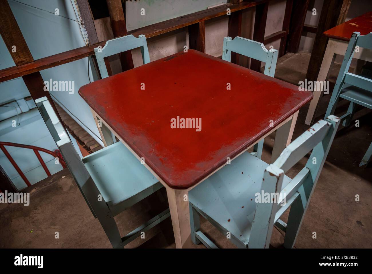 Quaint restaurant with rustic tables and chairs, El Tunco, surf town in ...