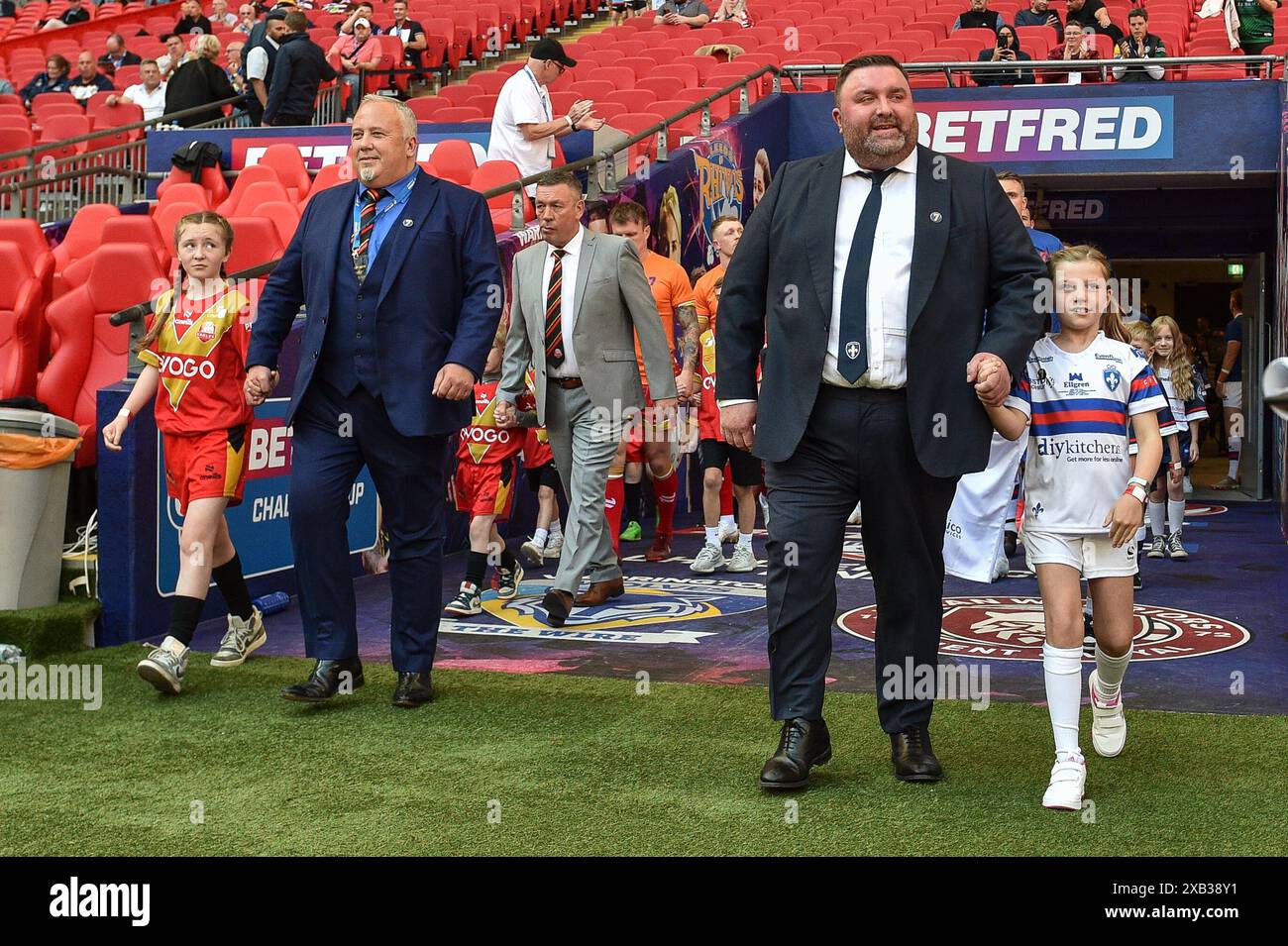 London, England - 8th June 2024 - Owner Matt Ellis leads his team ...