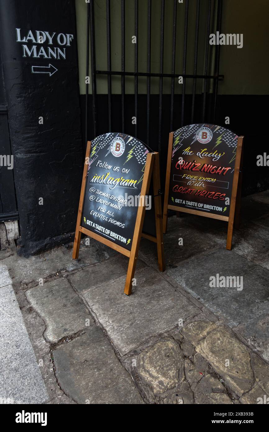 Folding signs at entrance to Lady of Mann pub in Liverpool Stock Photo ...