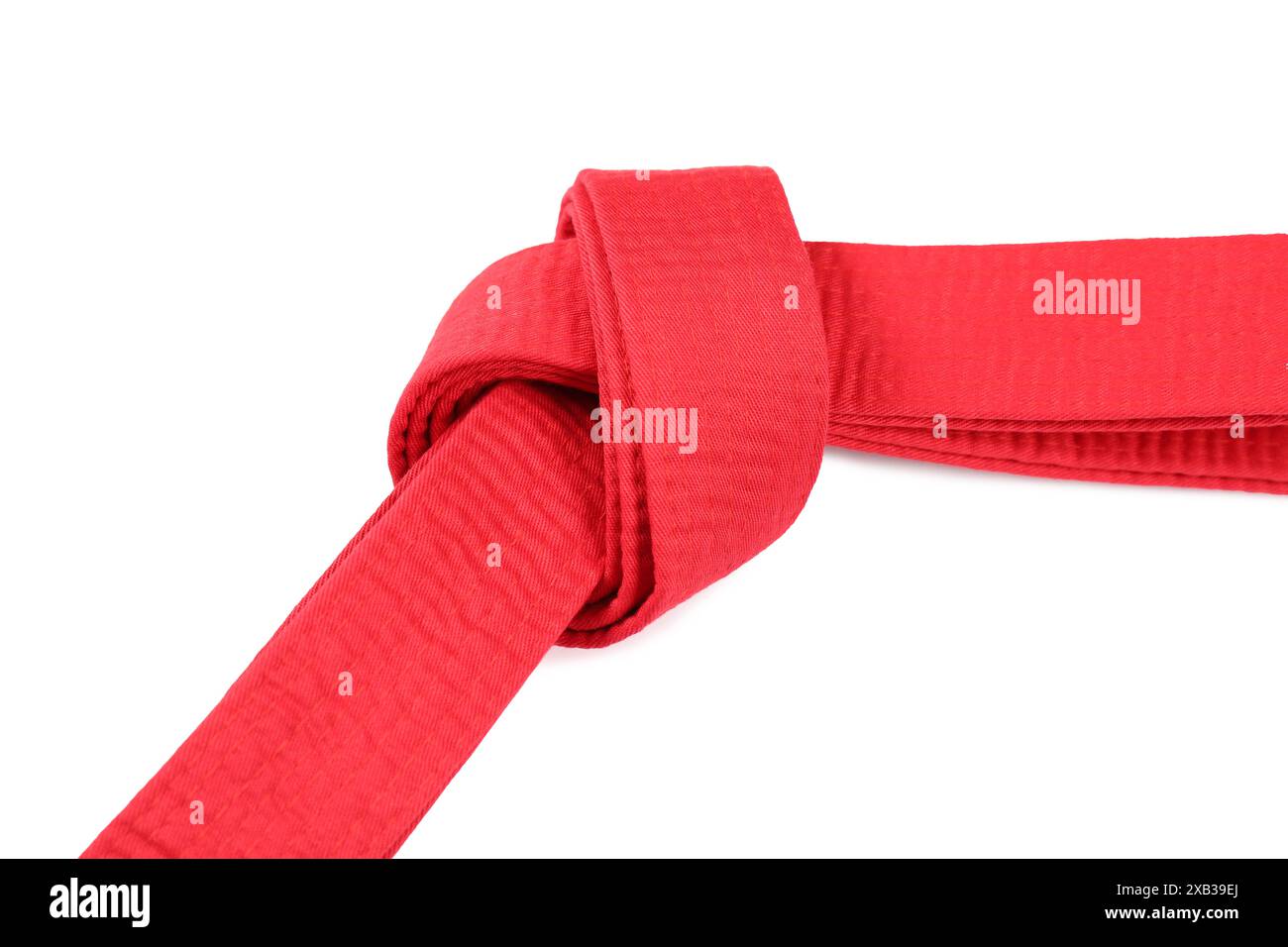 Red karate belt isolated on white. Martial arts uniform Stock Photo - Alamy