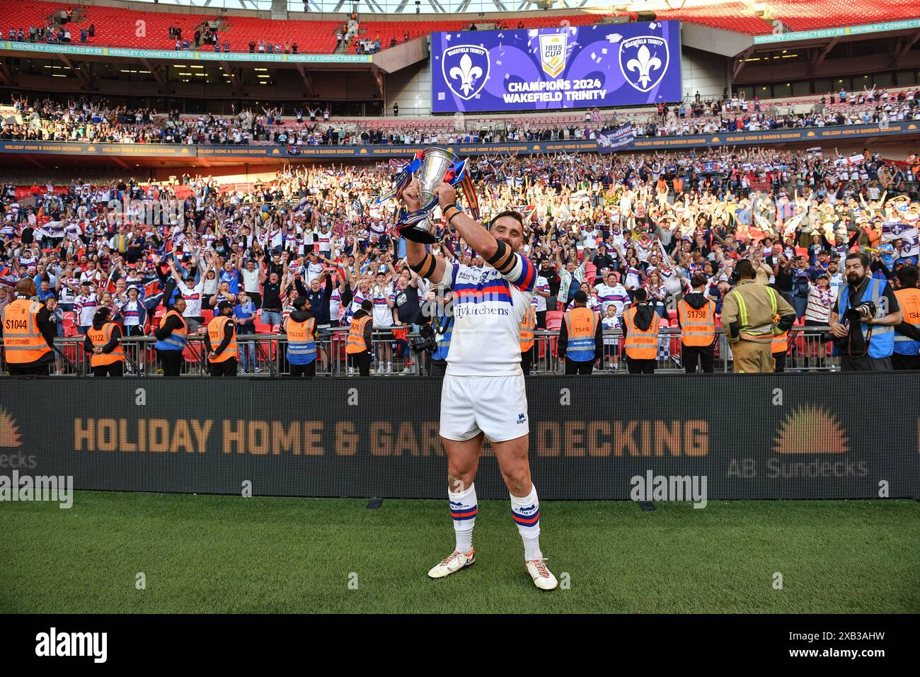 London, England - 8th June 2024 - Wakefield Trinity's Josh Bowden lifts ...