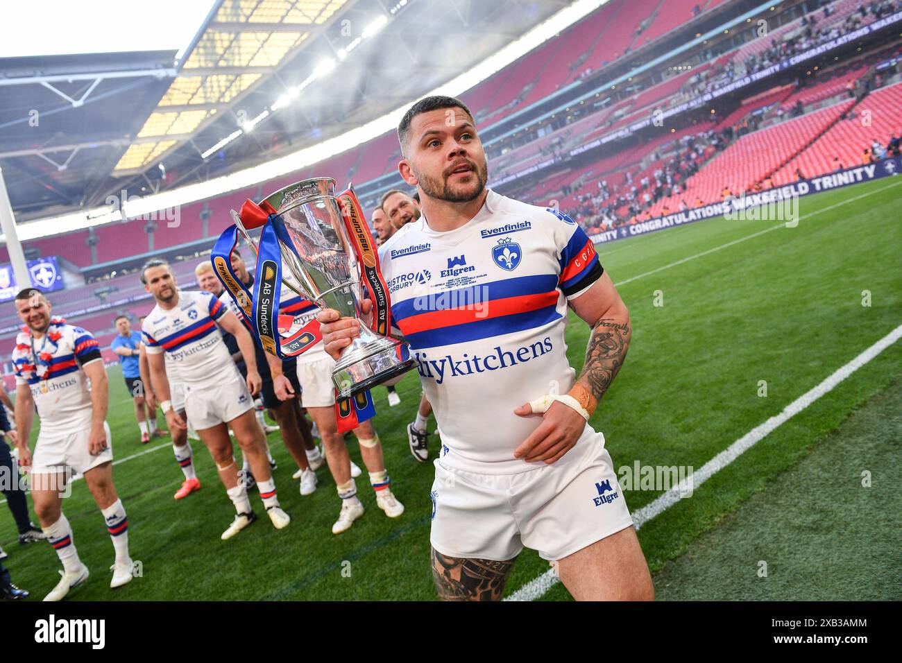 London, England - 8th June 2024 -Wakefield Trinity's Liam Hood lifts ...