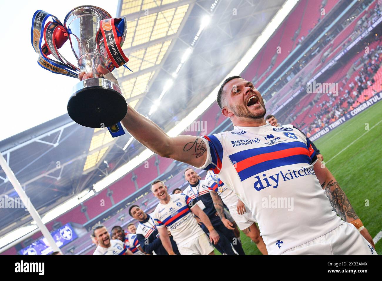 London, England - 8th June 2024 -Wakefield Trinity's Liam Hood lifts ...