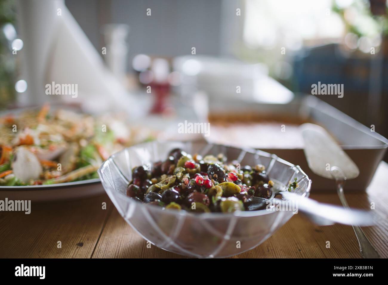 Table with party food inside hi-res stock photography and images - Alamy