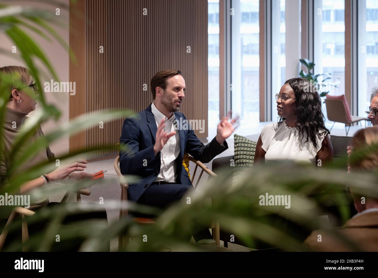 Businesswoman explaining strategy colleagues hi-res stock photography ...