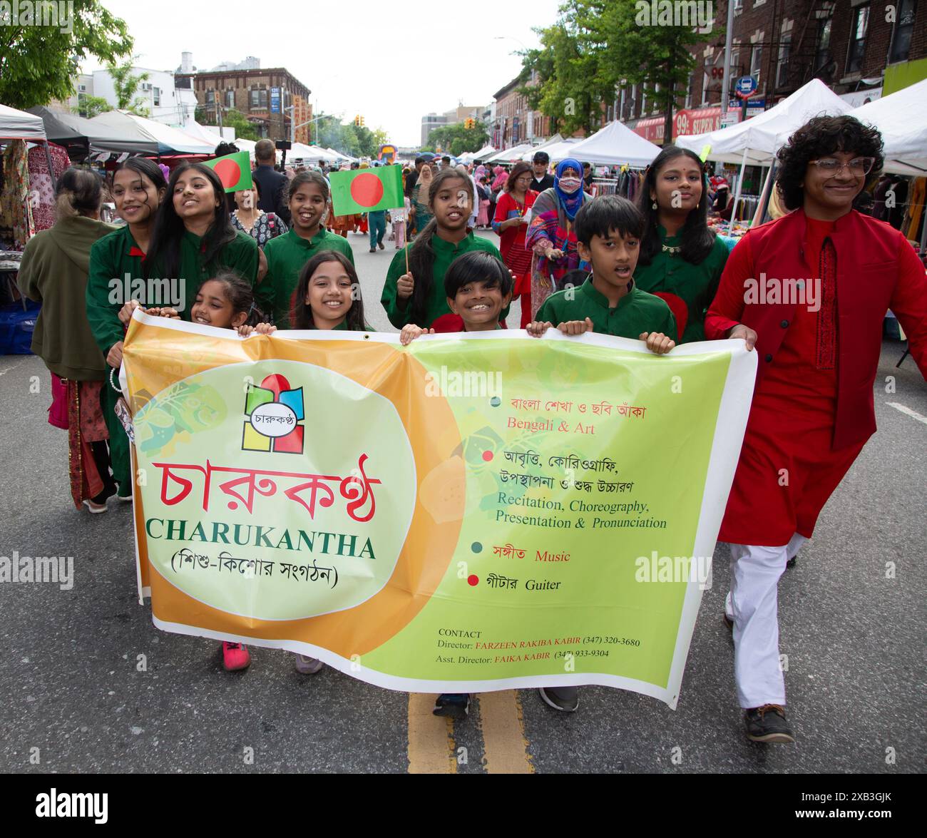 Young people with a banner promoting Chakantha at a Bangladeshi ...