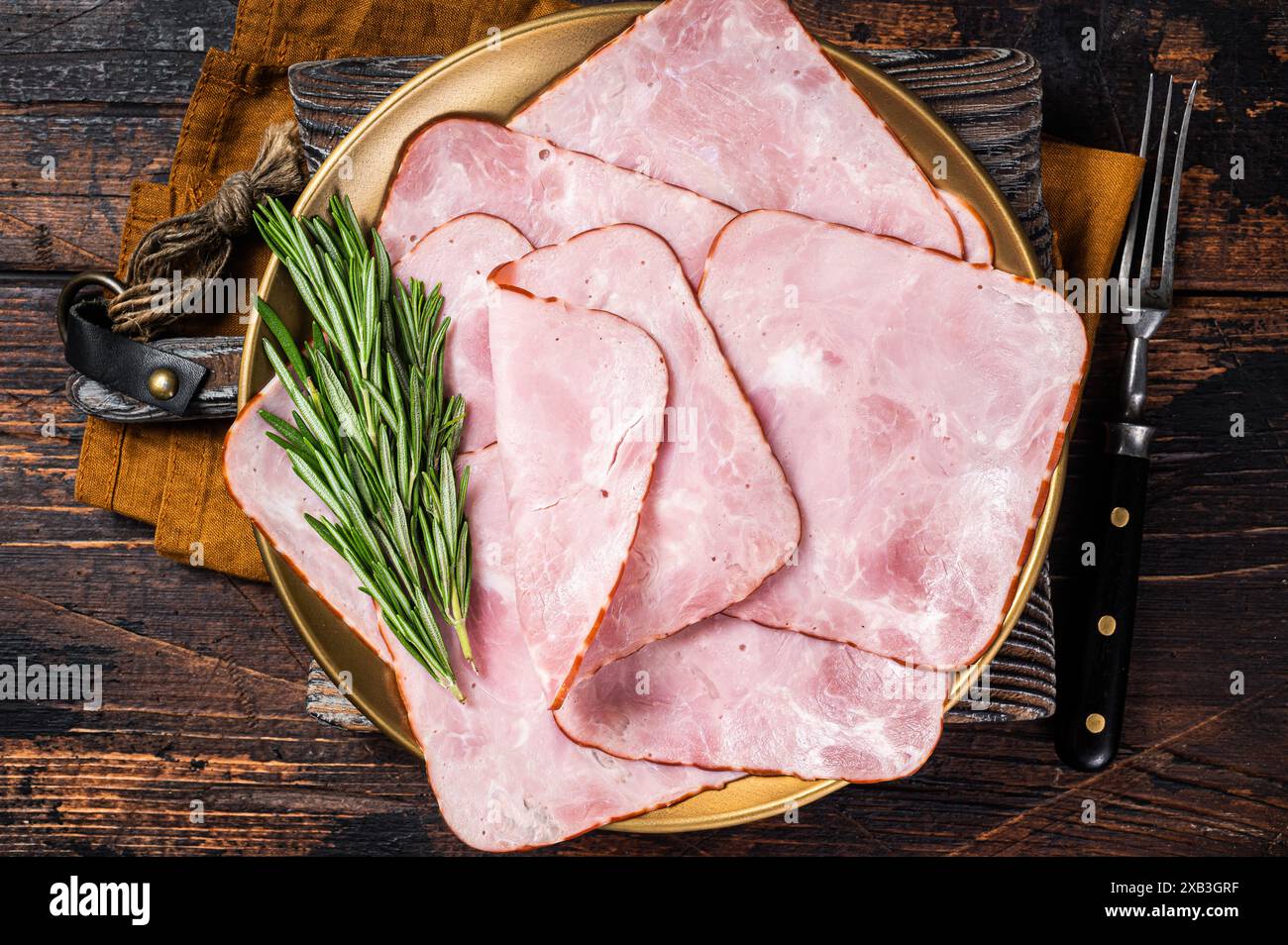 Square Sliced pork meat ham on plate. Wooden background. Top view Stock ...
