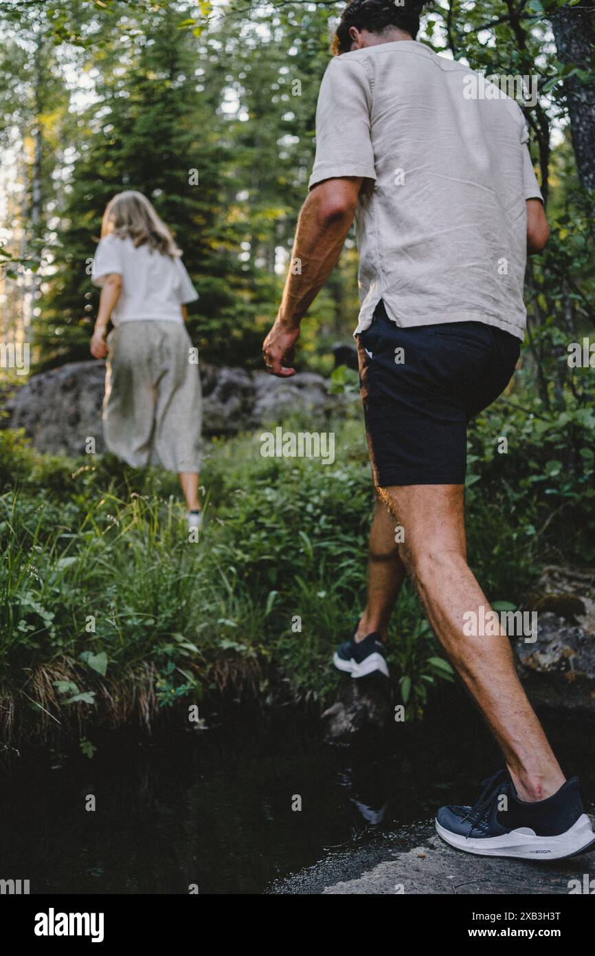 Adventurous young man hiking hi-res stock photography and images - Alamy