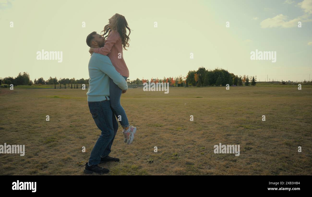 Young laughing Caucasian lovers couple woman female lady spouse running ...