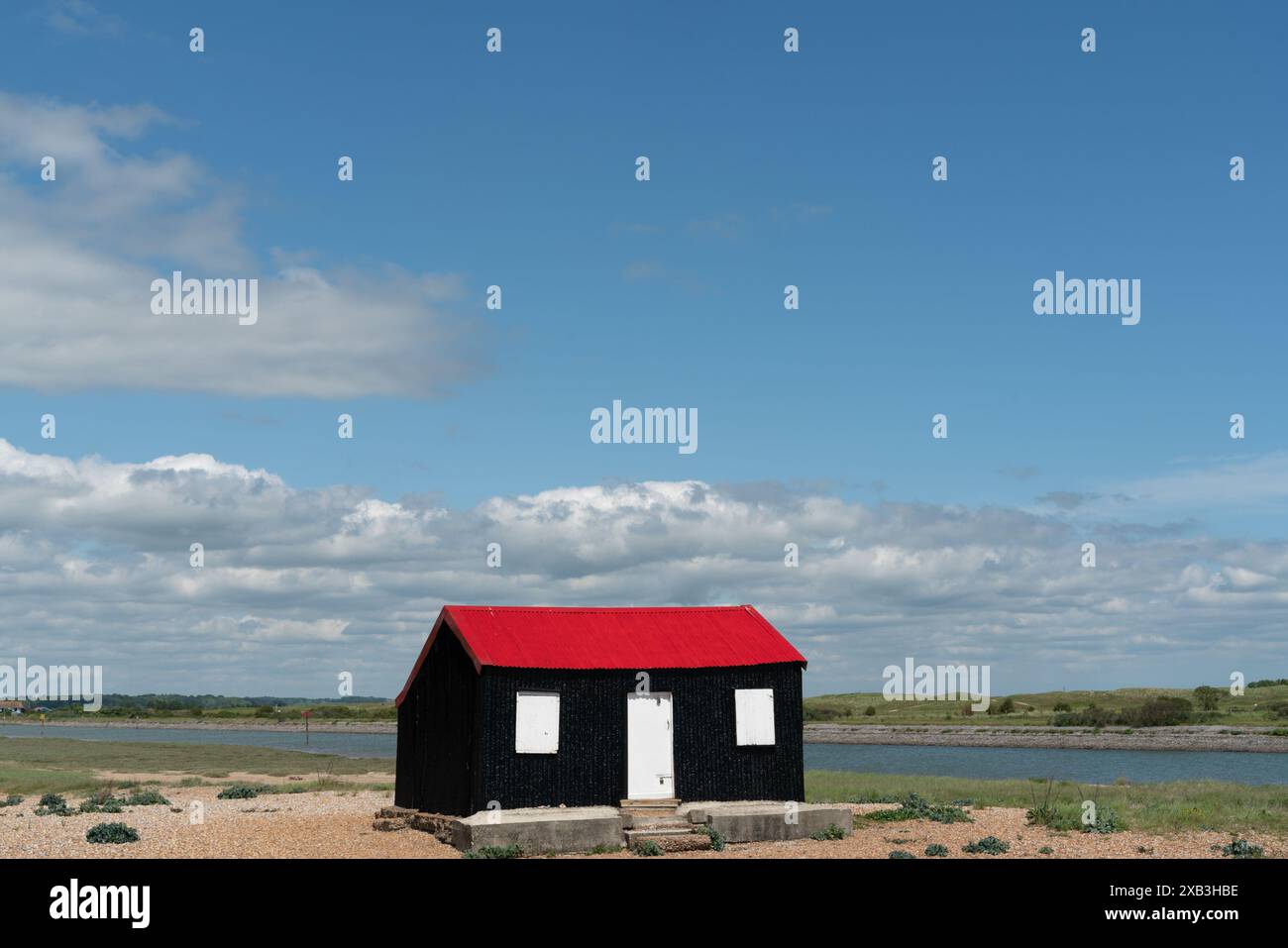 The Red Roof Hut in Rye Harbour Stock Photo - Alamy