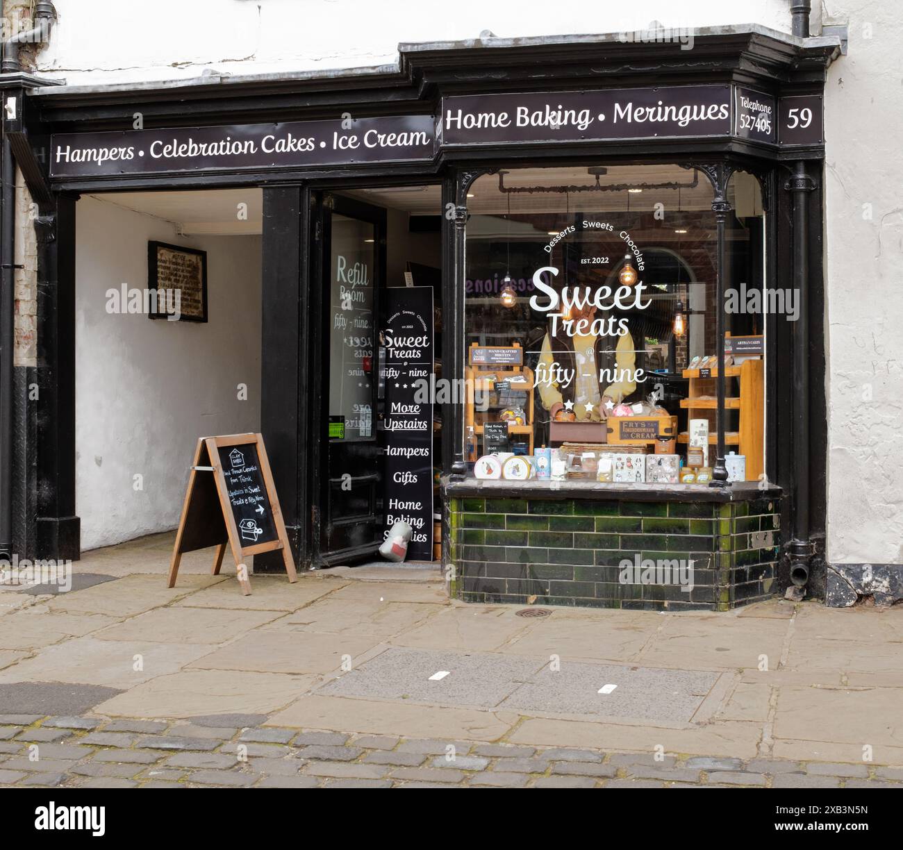 Sweet Treats traditional shop front of Thirsk, North Yorkshire, England ...