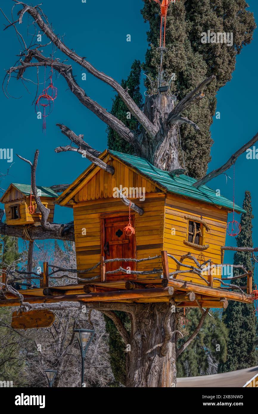 big tree house in autumn. vertical photo Stock Photo - Alamy