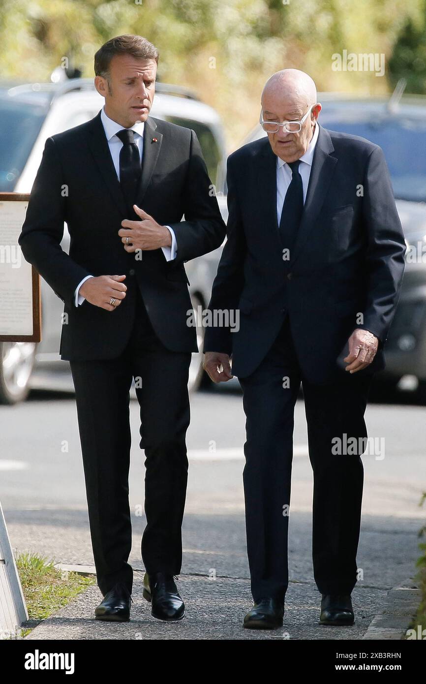 Emmanuel Macron and Roland Gonieau, President of the CDM in Tulle to ...