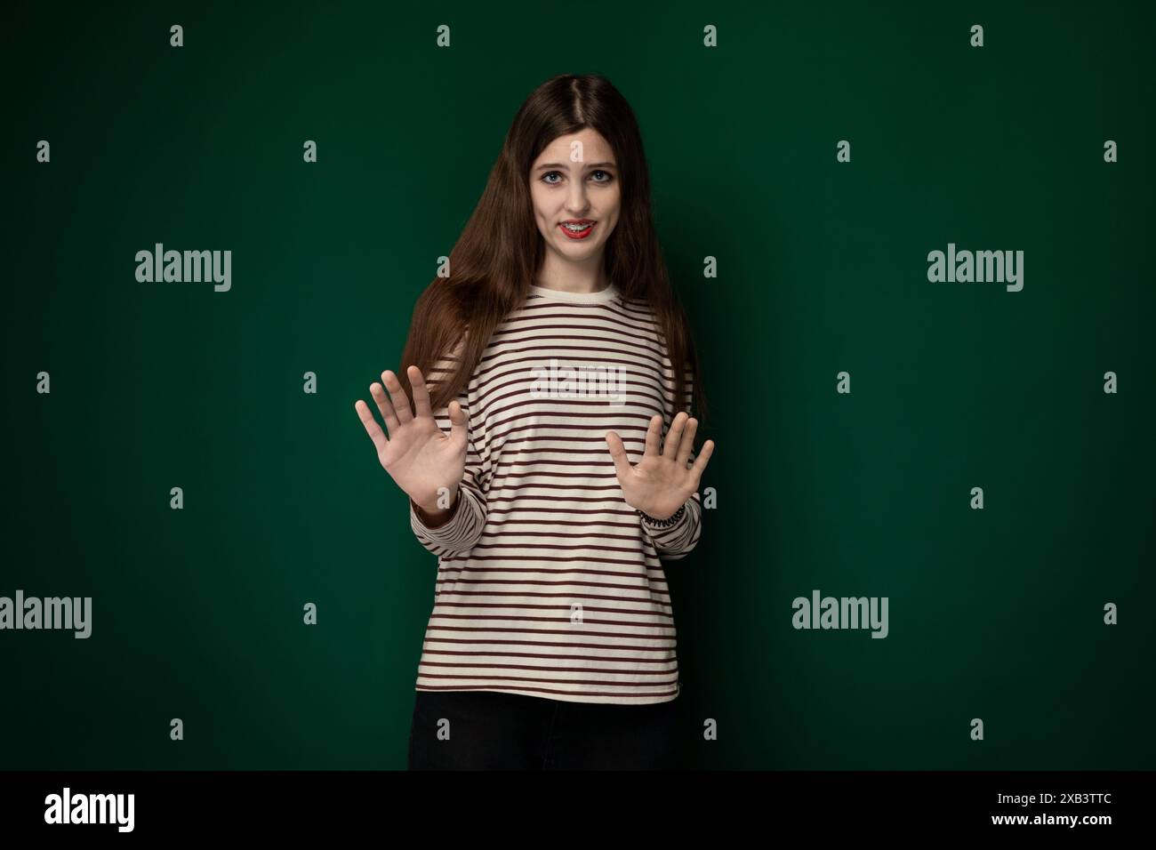 Woman Holding Hands Out in Front of Her Stock Photo - Alamy