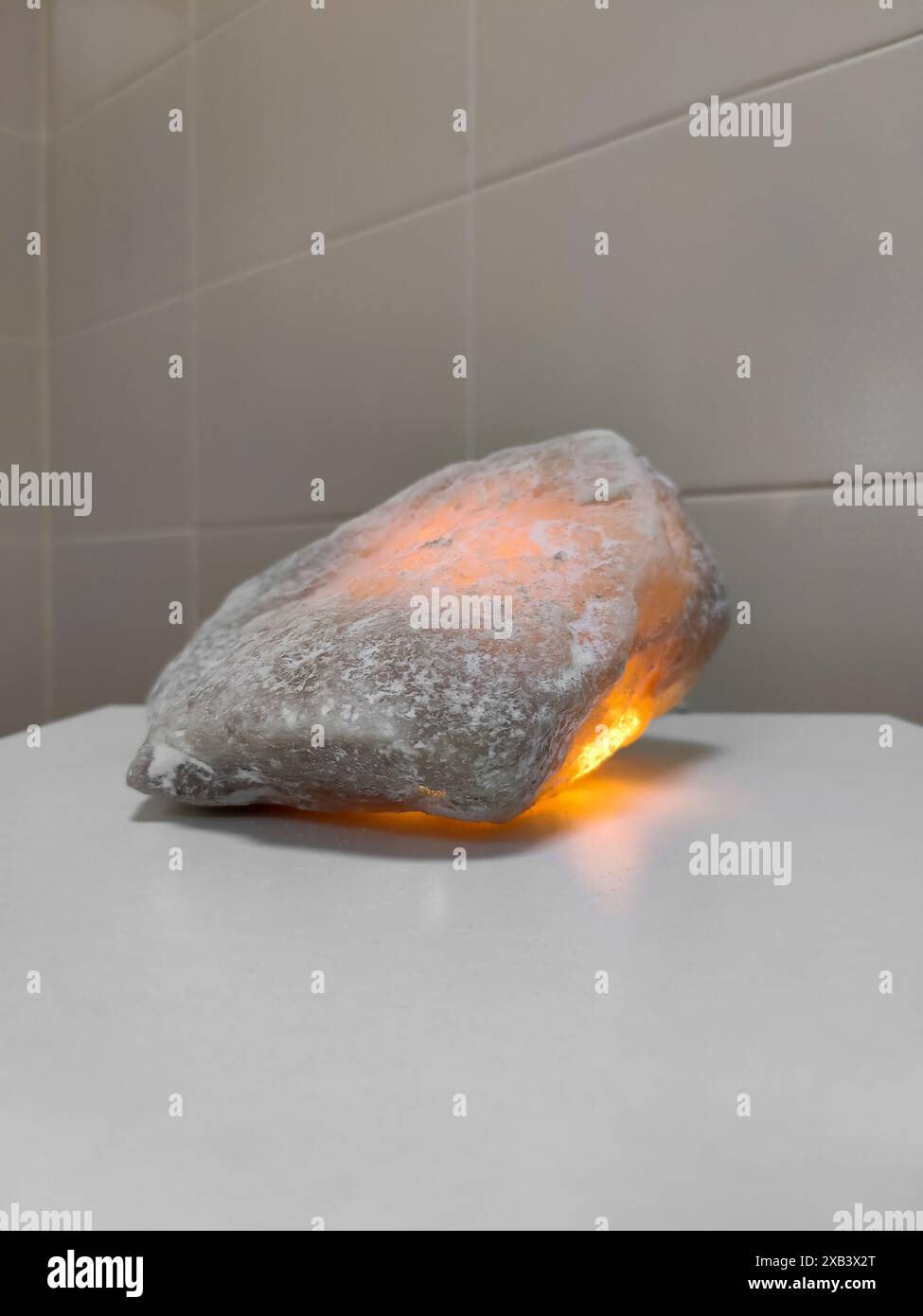 Illuminated salt lamp is made of natural crystal rock Himalayan salt ...