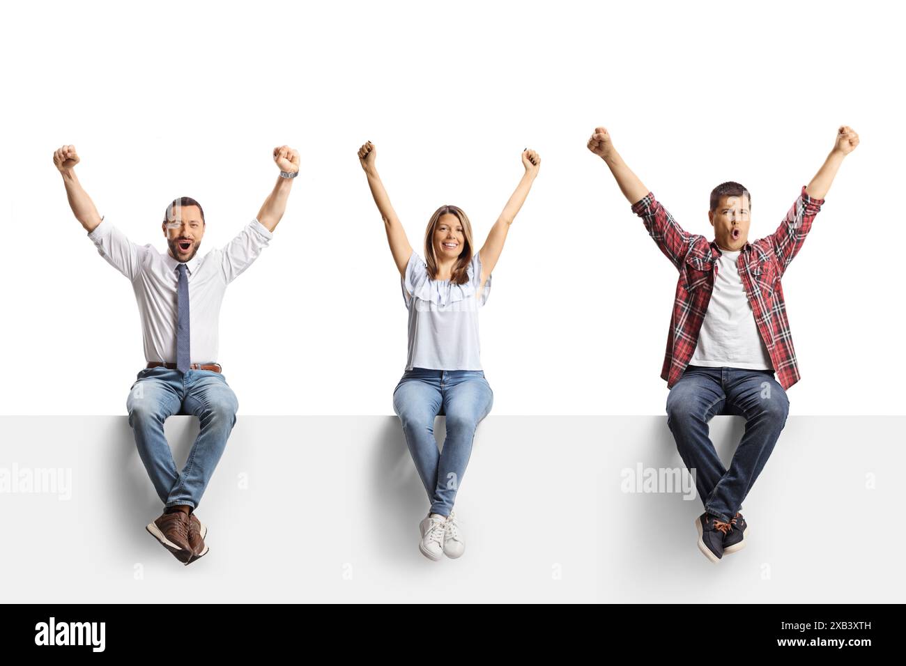 Excited men and a woman with arms up sitting on a blank panel isolated ...