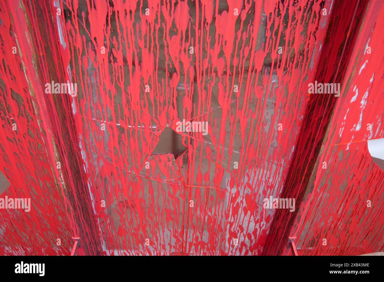 London, UK. 10th June, 2024. Windows are smashed and covered in red ...