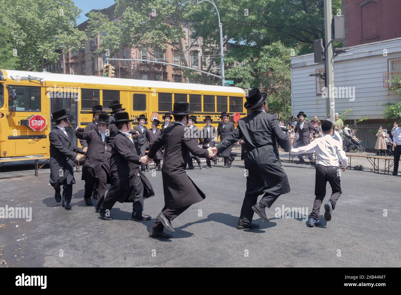 Hasidic teachers and older students dance celebrate the Lag B'Omer ...