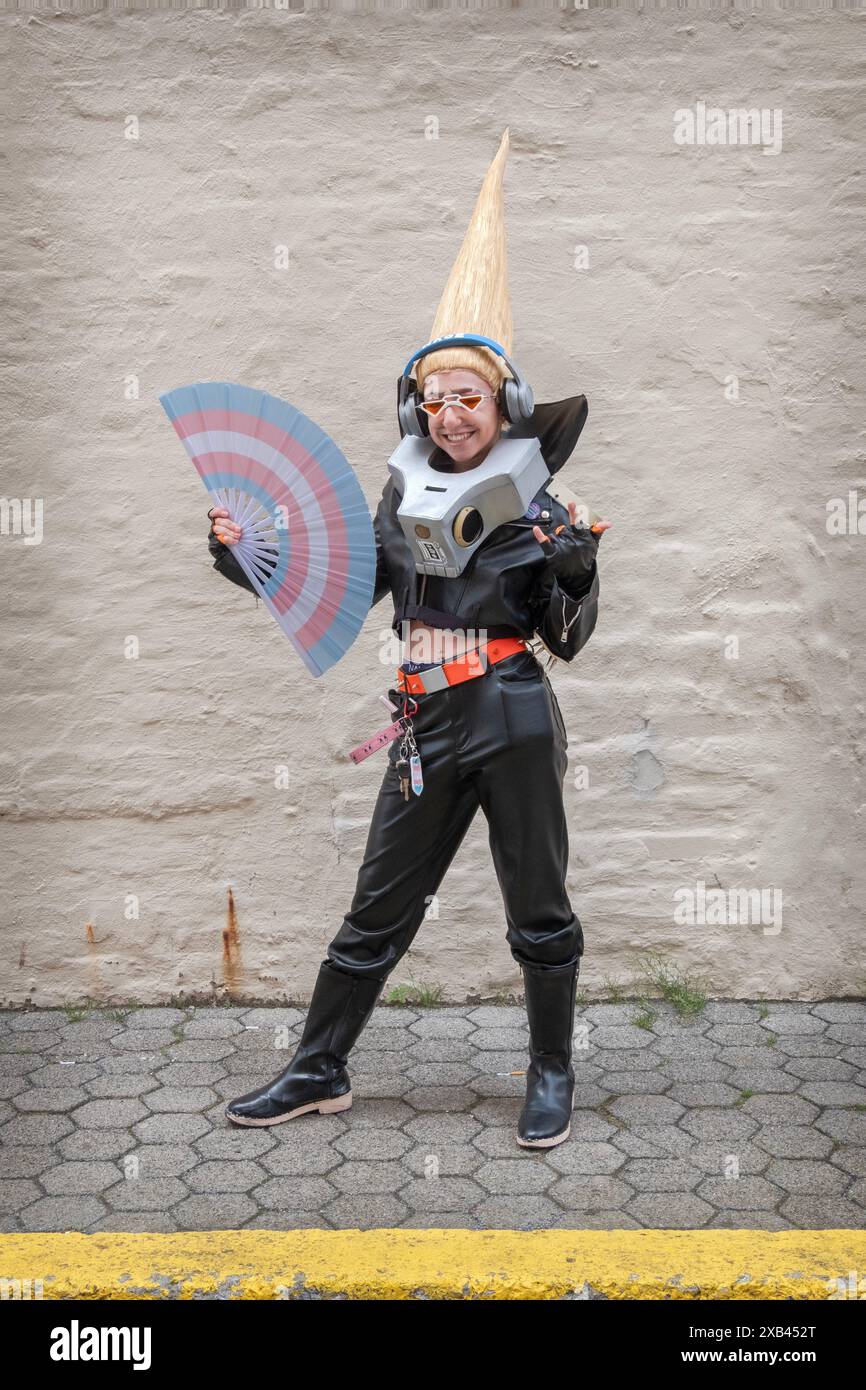 A trans female to male dressed in a unique costume like a futuristic ...