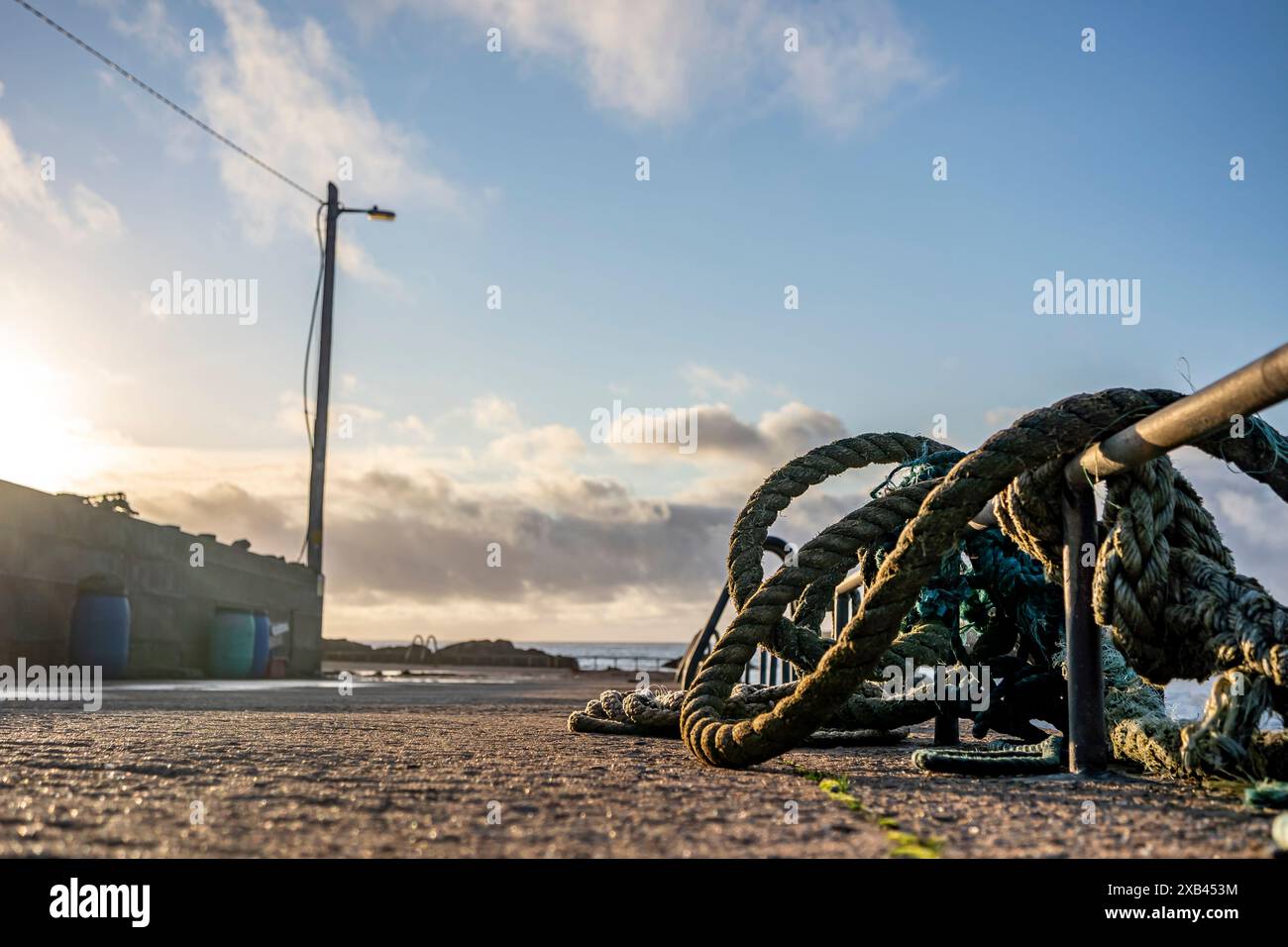 Ropes and ladder into the sea at coastal harbour Stock Photo - Alamy