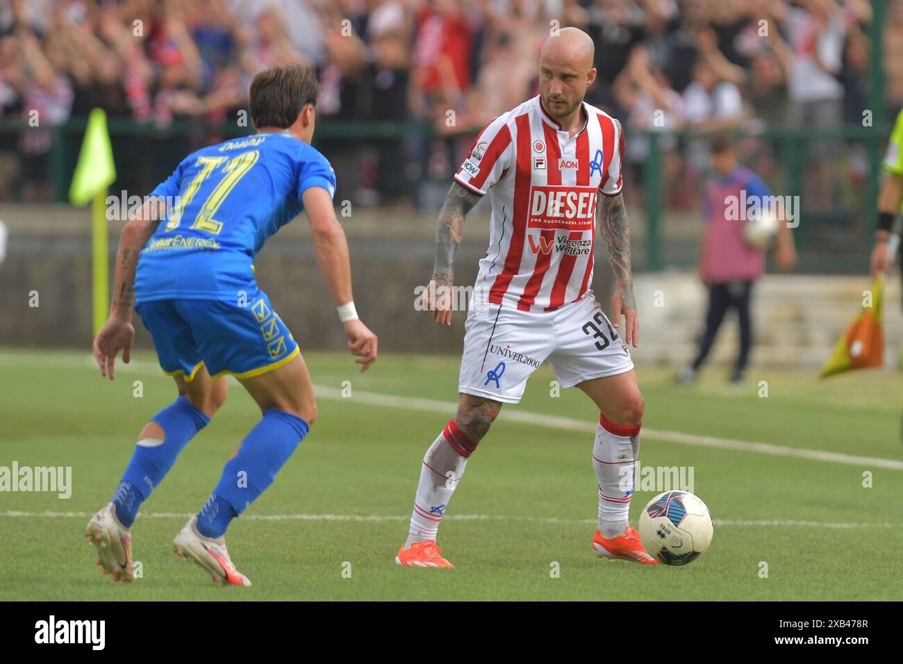 Filippo Costa (Vicenza) thwarted by Simone Zanon (Carrarese) during ...