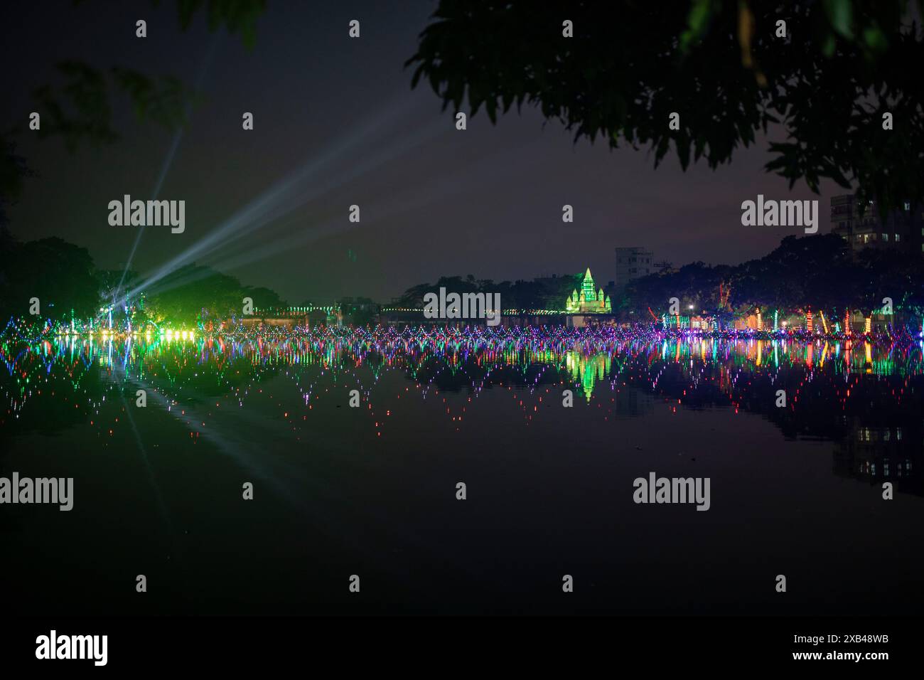 Diwali illumination at the Sri Sri Baradeswari Kalimata Temple pond at ...