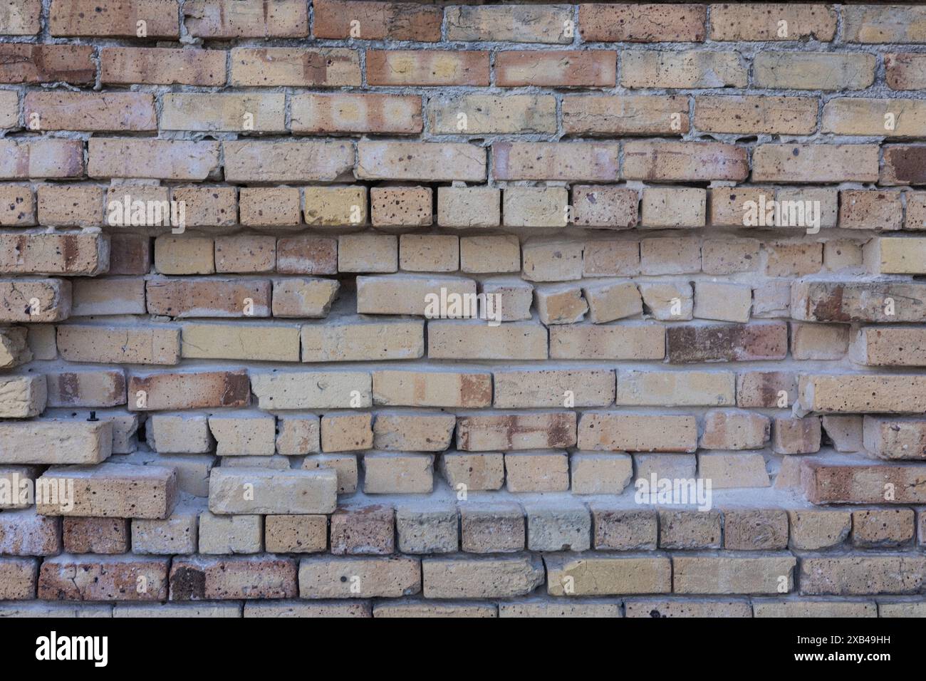 White brick building structure with missing bricks full frame Stock ...