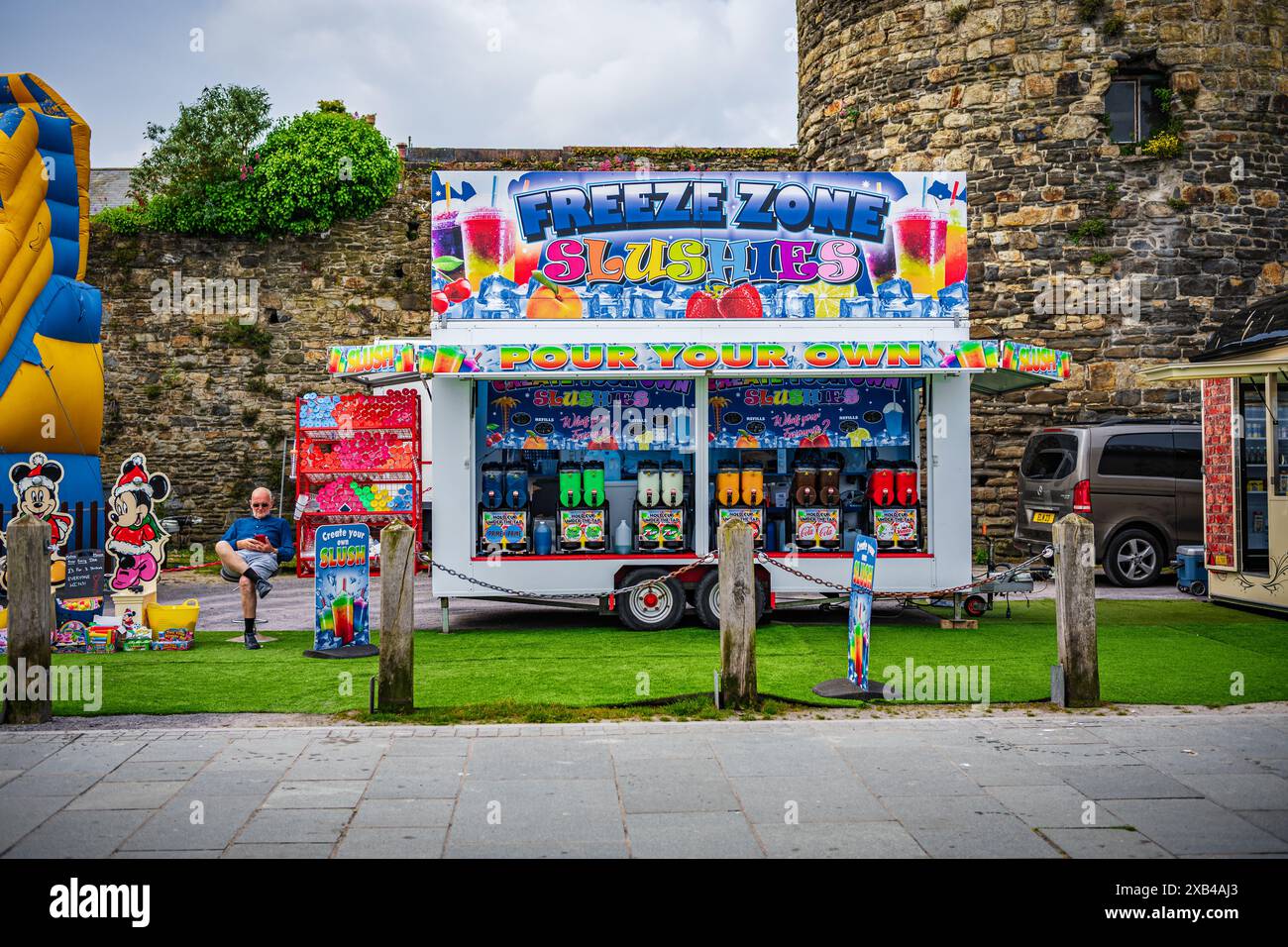 Conwy Wales Uk 06-01-2024. Colorful slushie stand at outdoor fair with ...
