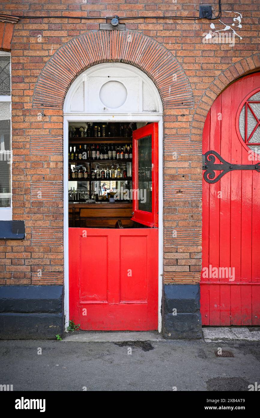Conwy Wales UK 06-01-2024. Charming rustic bar entrance with a vibrant ...