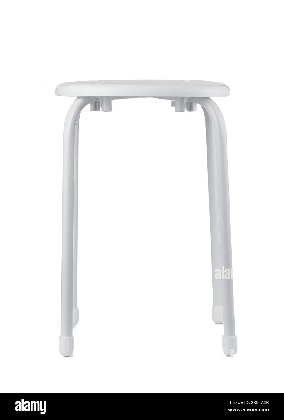 Front view of white plastic stackable stool with metal frame isolated ...