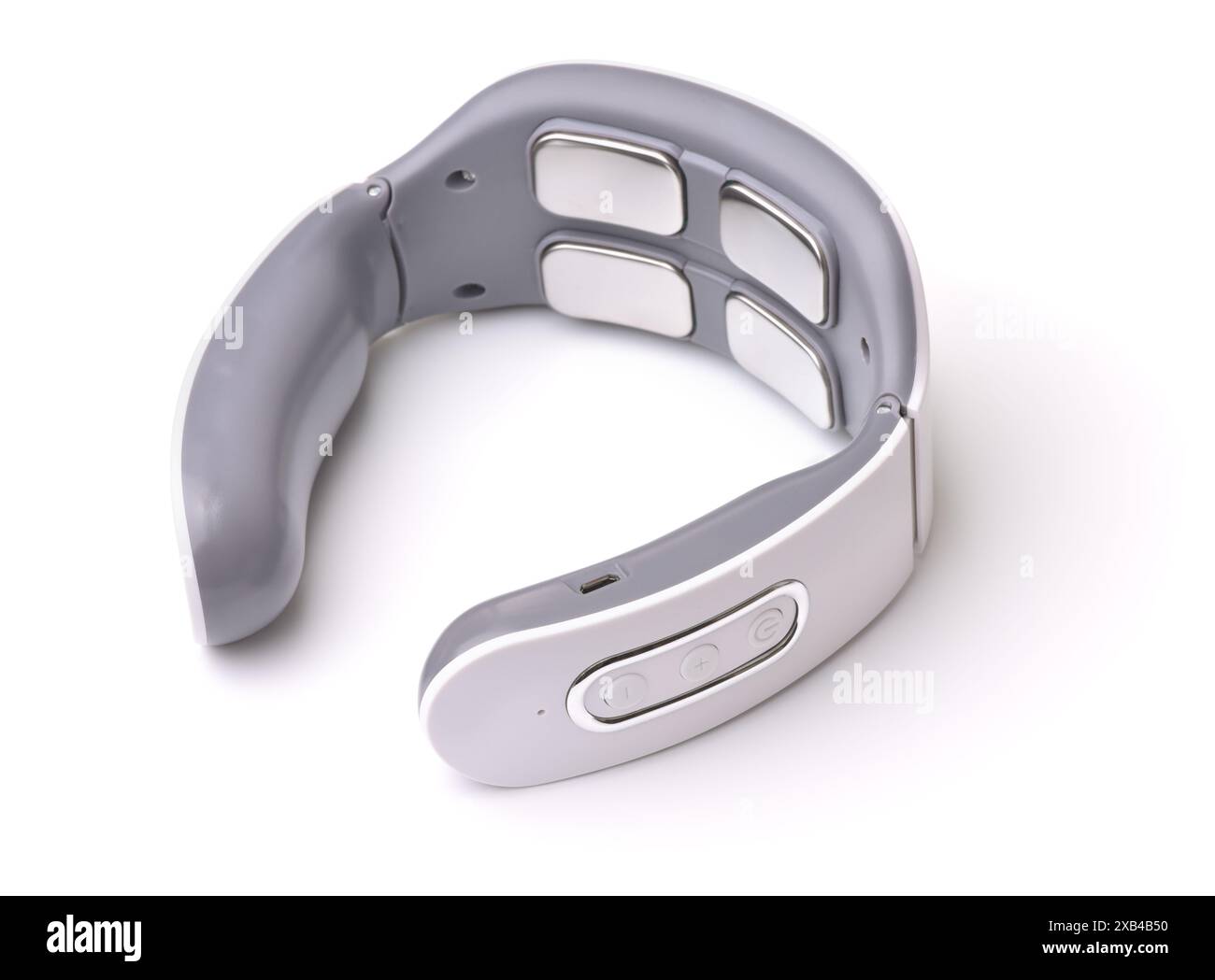 Cordless electric pulse neck massager isolated on white Stock Photo - Alamy